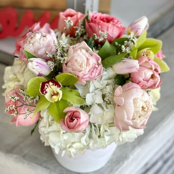 Florist choice bouquet in a vase with roses - Flower Lab